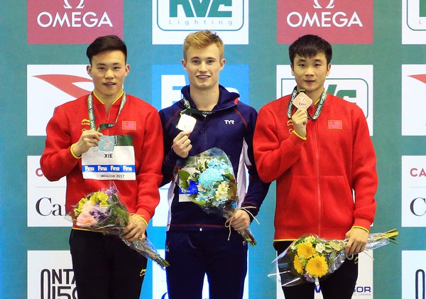 Laugher excels to win gold | British Swimming