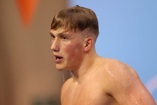 Harris and Morgan clinch close victories in backstroke battles ...